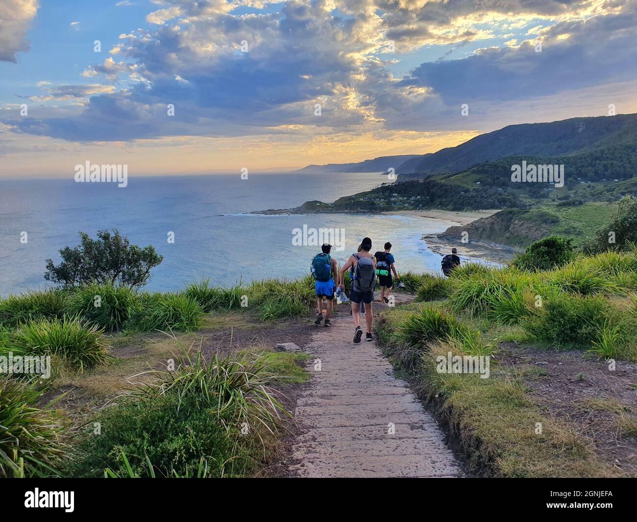 The traveler walking on the footpath going to the beach Stock Photo - Alamy