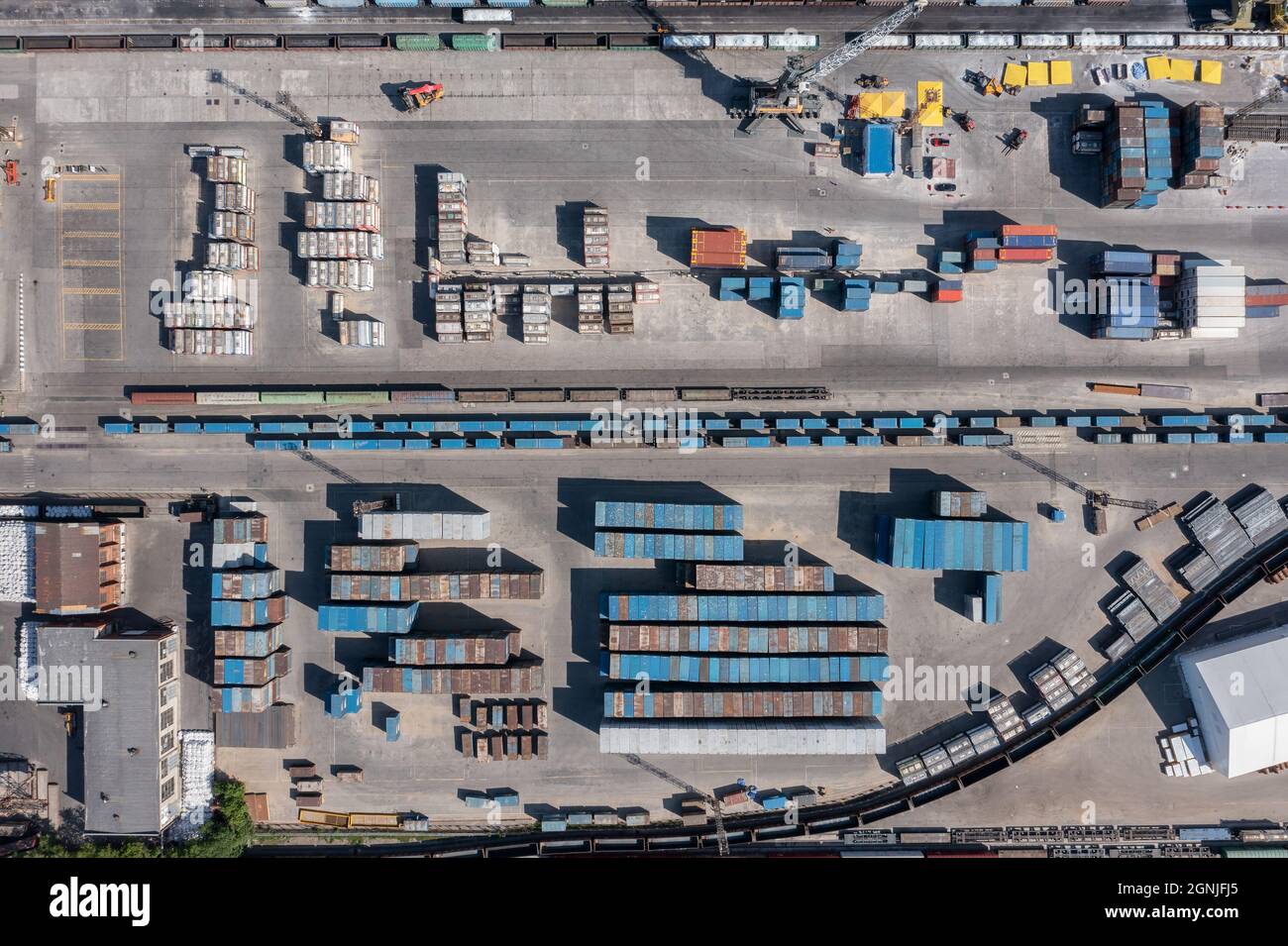Cargo container terminal with railway Stock Photo - Alamy