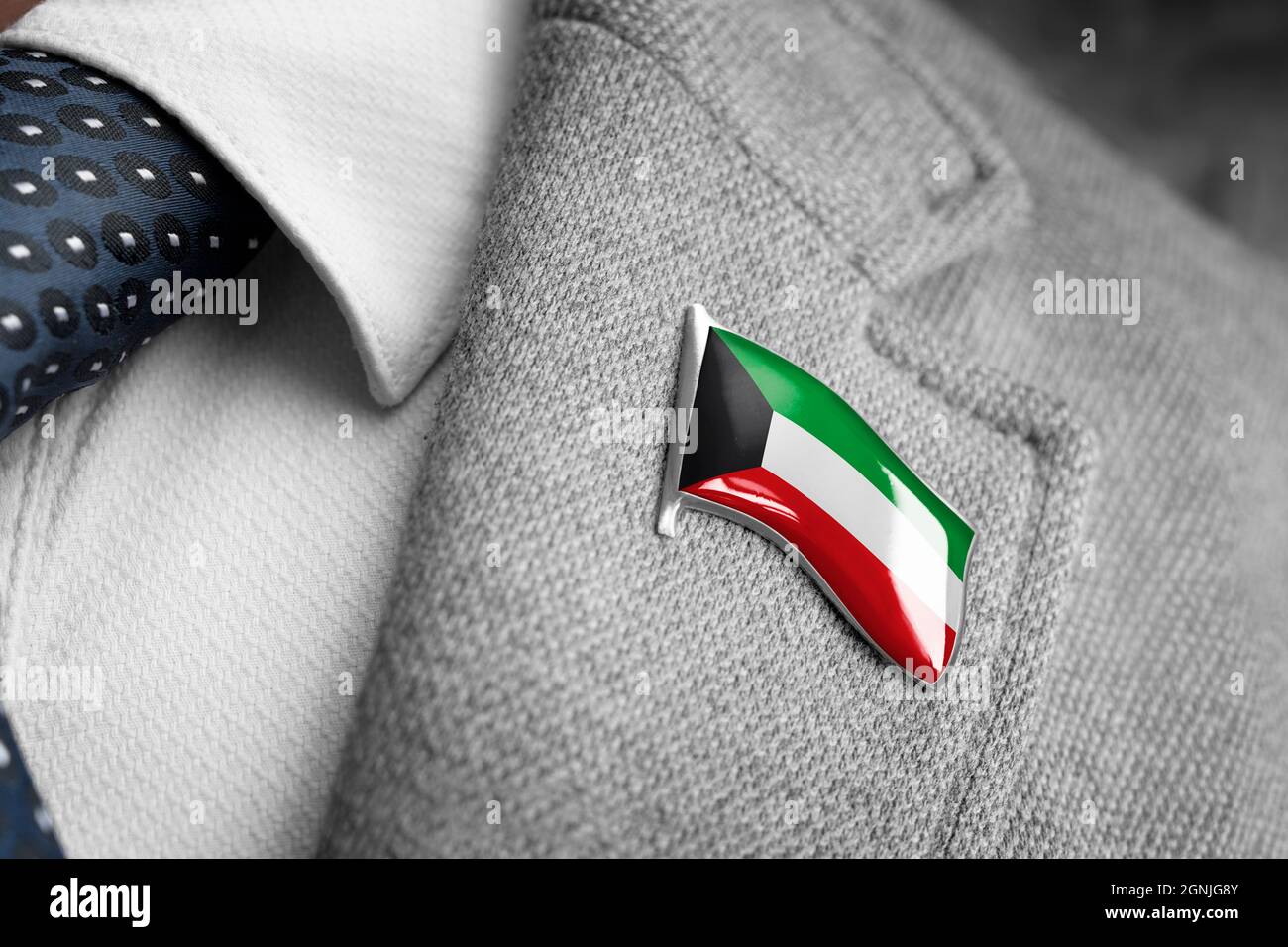 Metal badge with the flag of Kuwait on a suit lapel Stock Photo - Alamy