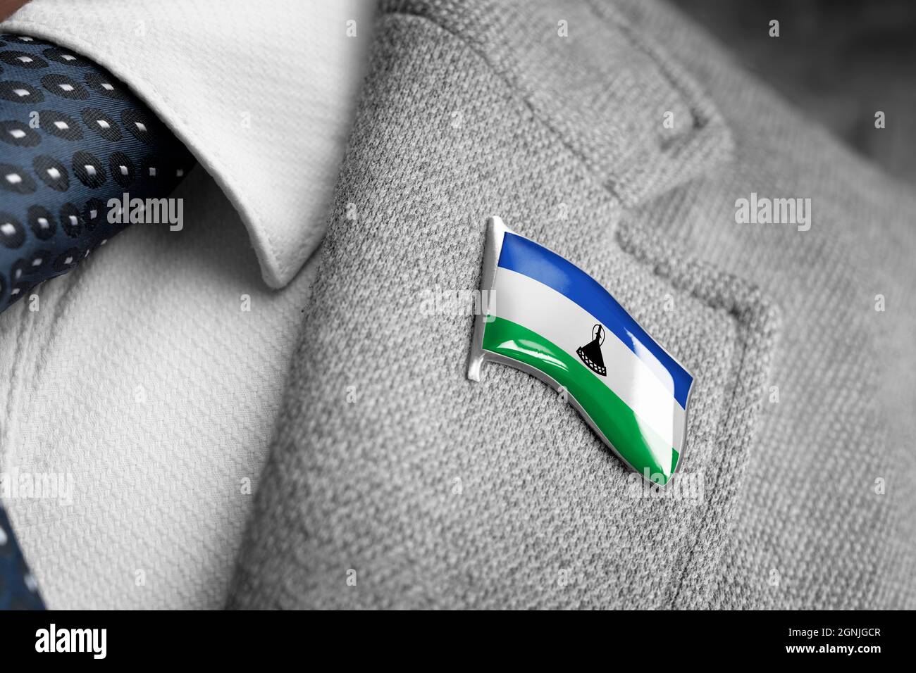 Metal badge with the flag of Lesotho on a suit lapel Stock Photo - Alamy
