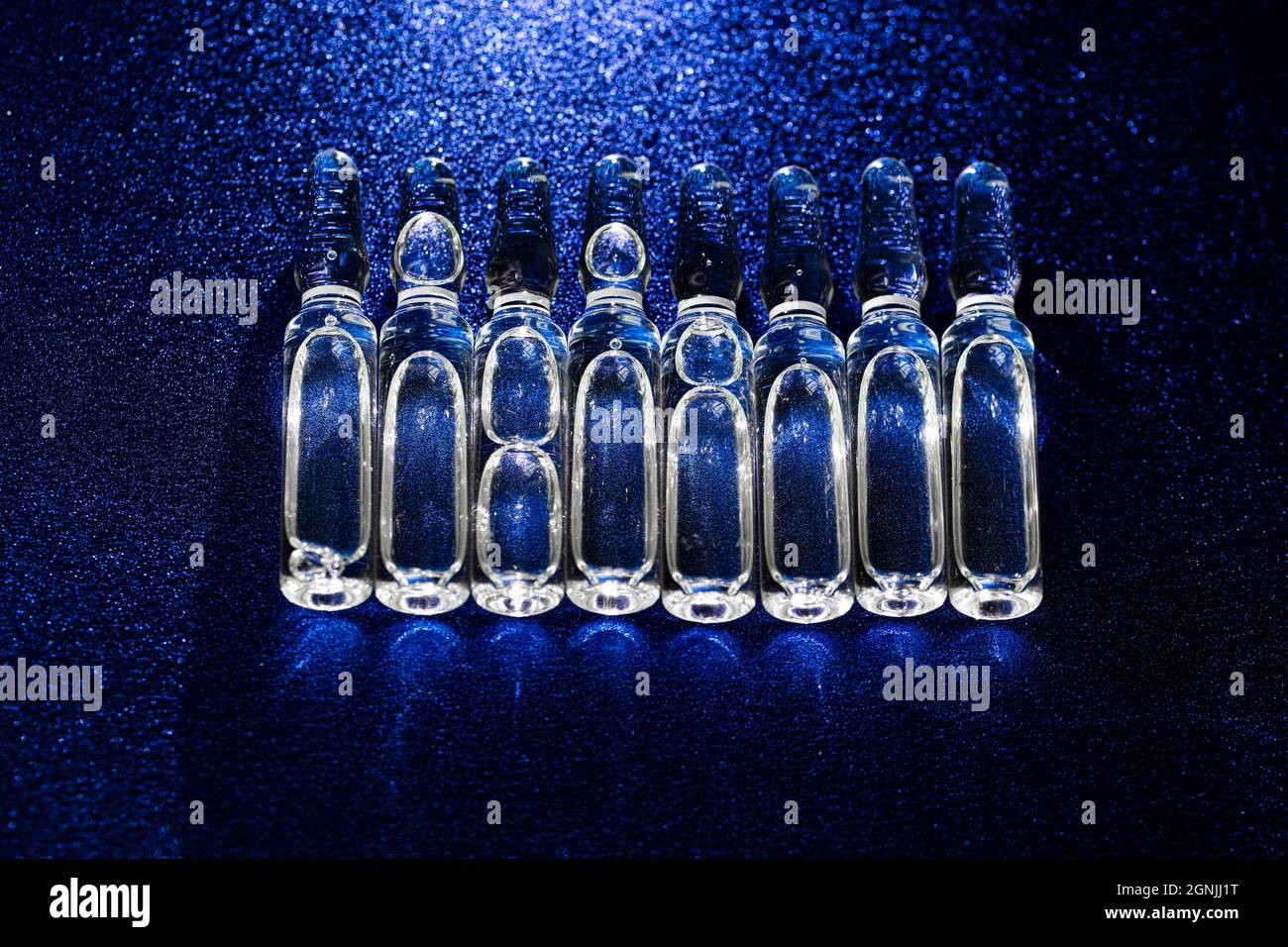 Glass medical ampoules for injection. Ampoules with vaccine, medicine ...