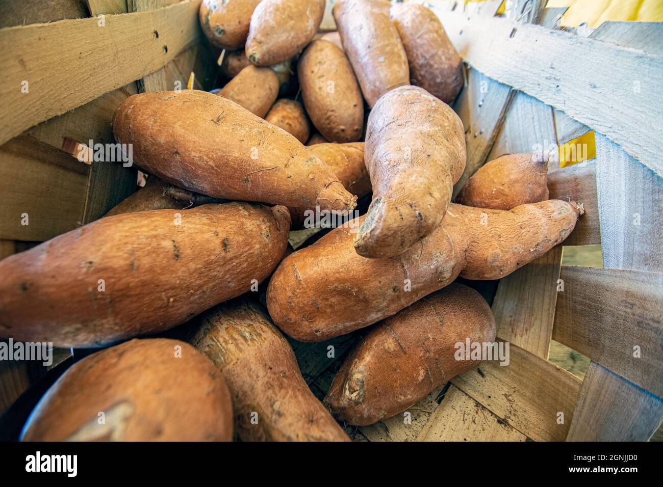View inside a basket full of sweet potatoes Stock Photo - Alamy