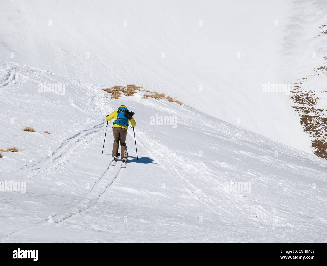 Skier enjoying skiing in a remote area of the Bucegi Mountains in ...