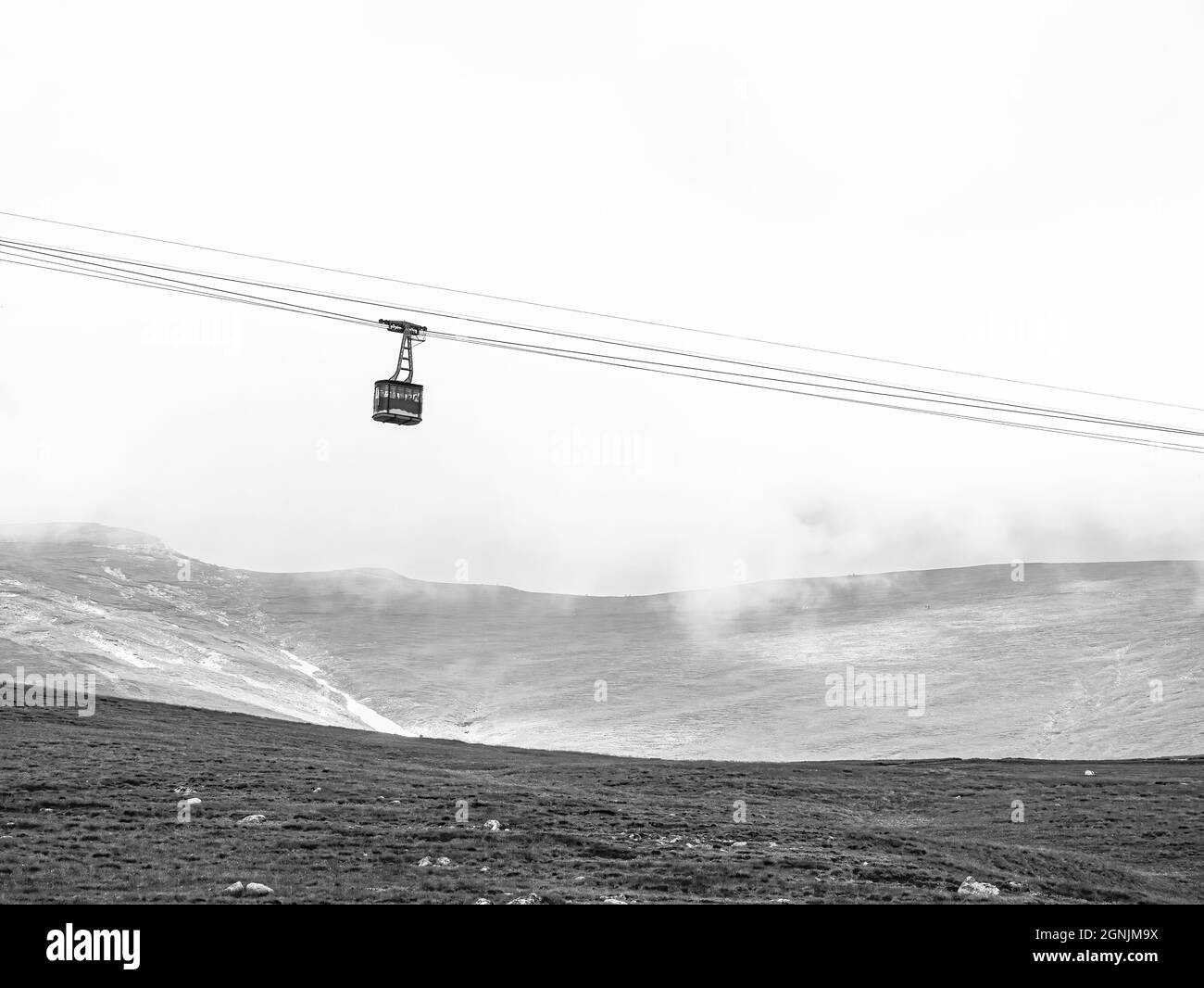 Old black and white picture with a cable car or telecabin in the Bucegi ...