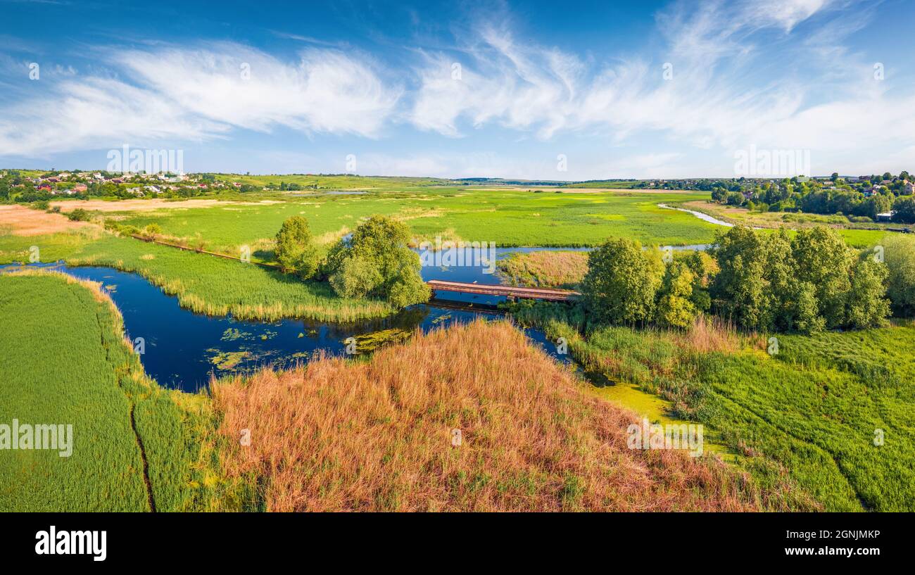 View from flying drone. Sunny morning view of bridge over Seret river ...