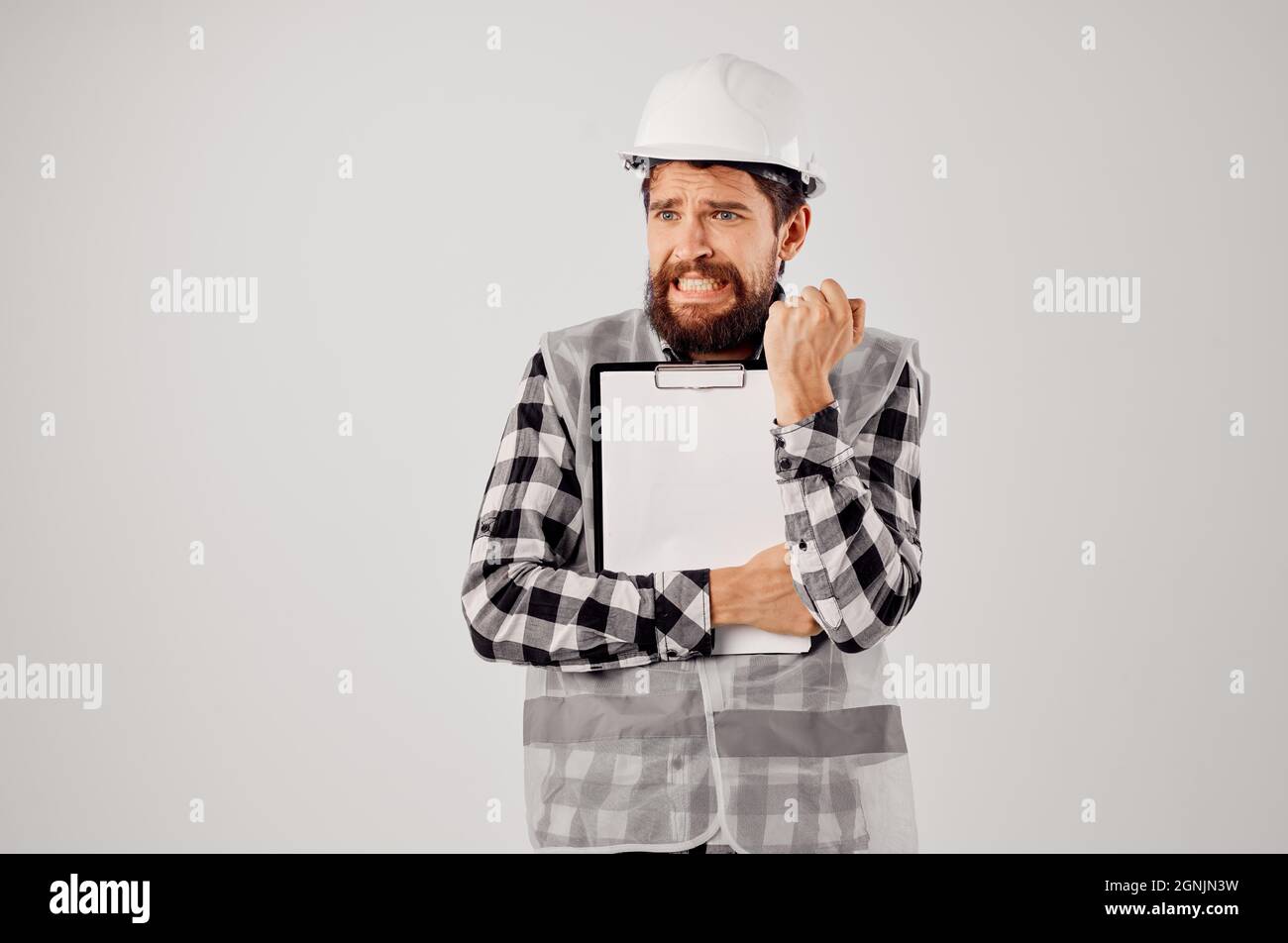 engineer with documents and drawings blueprints light background Stock ...
