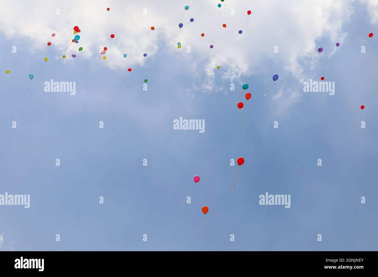 Many balloons flight in the sky during the party Stock Photo - Alamy