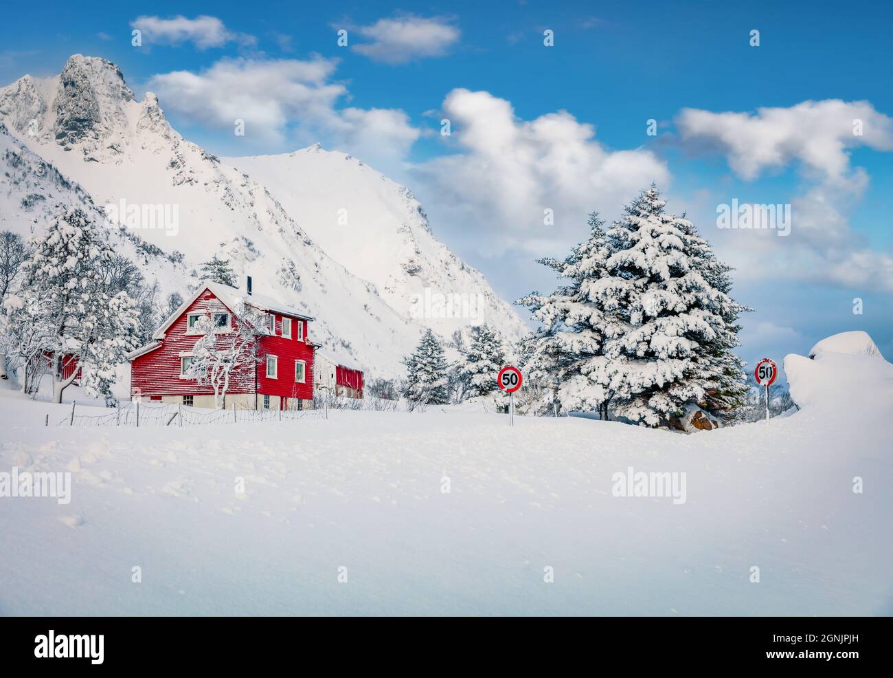 Рuge snowfall covered the road.Bright wWinter scene of Lofoten islands ...