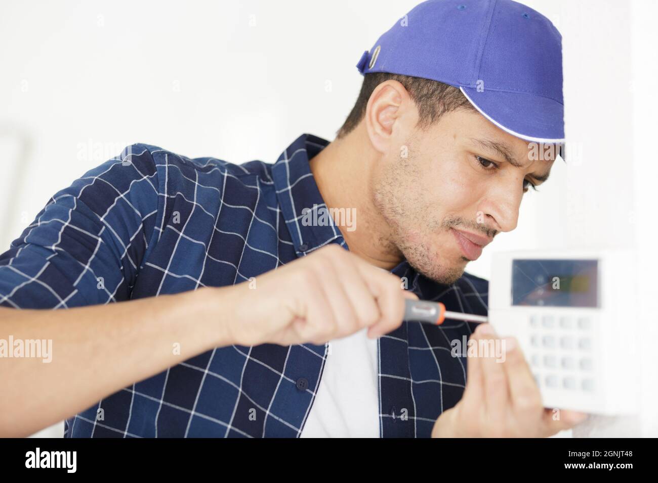 Fixing a wall hi-res stock photography and images - Alamy