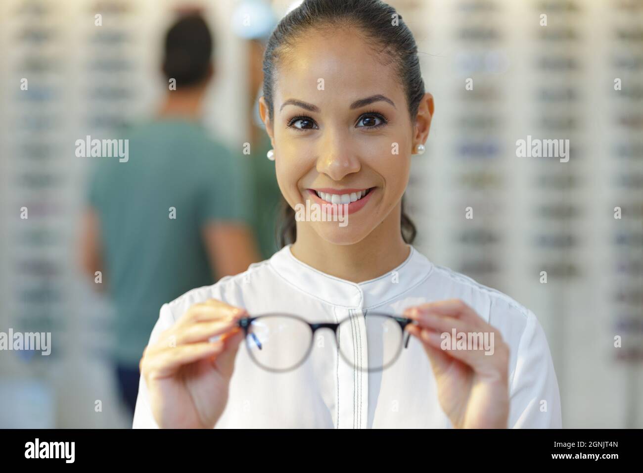 Optic employee hi-res stock photography and images - Alamy