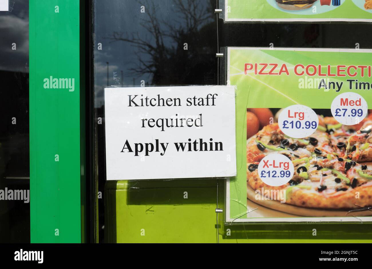 Kitchen staff equired sign on a fast food tke away shop in ...