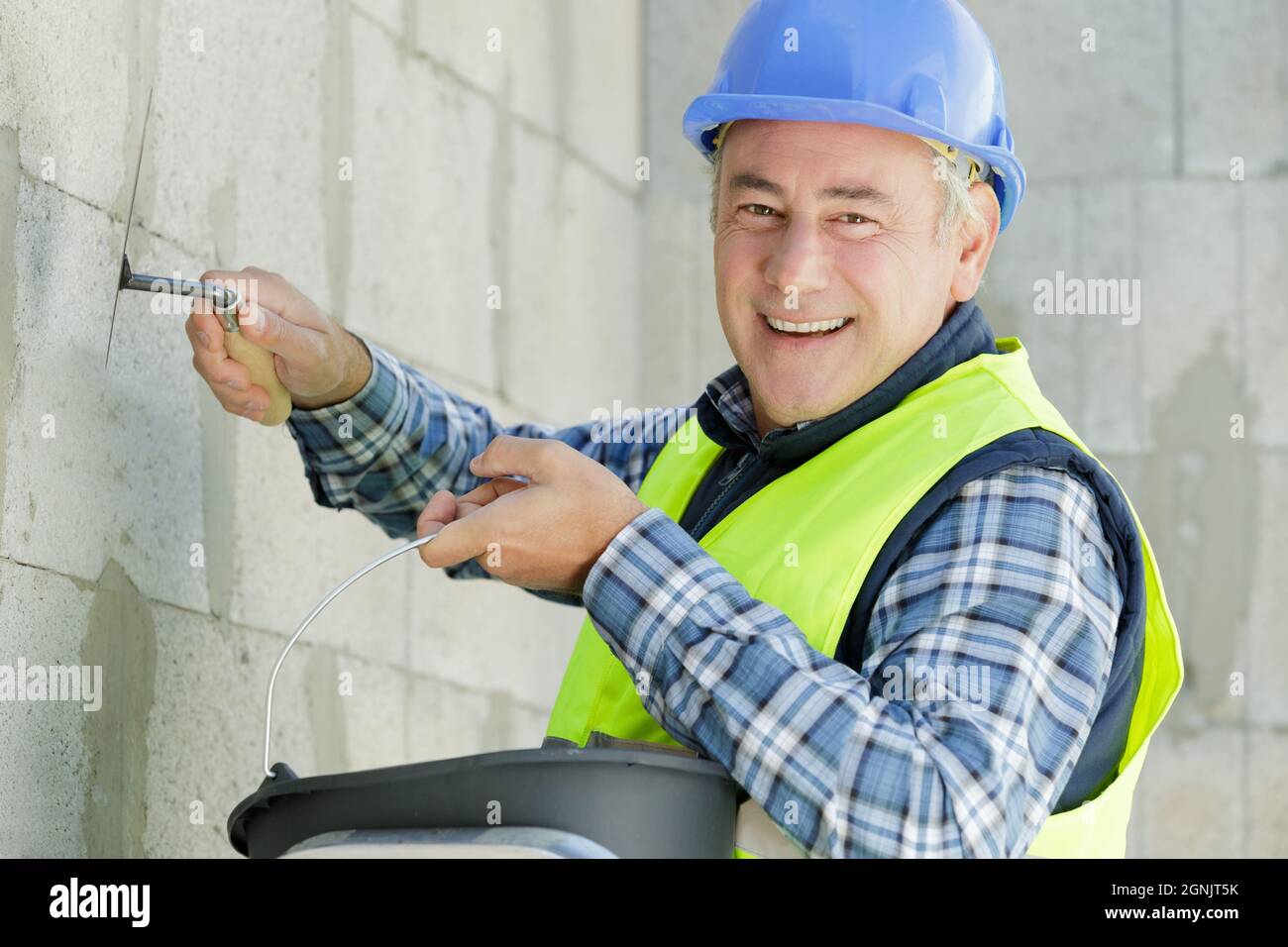 man plastering a brick wall Stock Photo - Alamy
