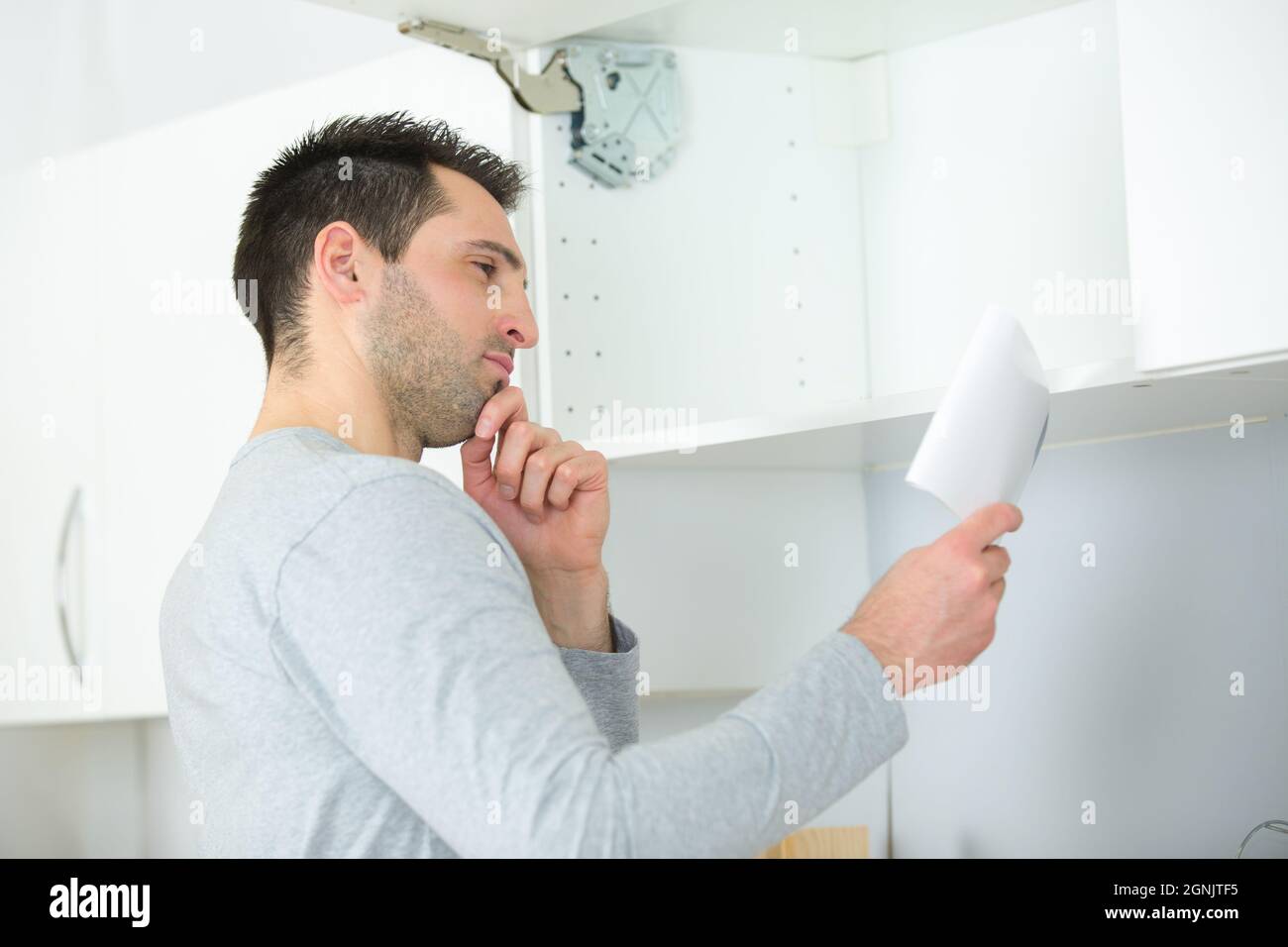 Reading kit man hi-res stock photography and images - Alamy