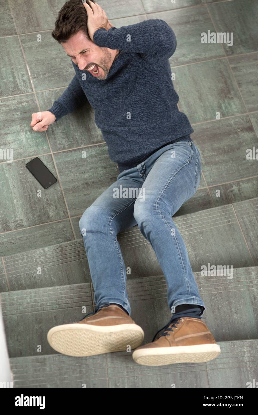 man falling from stairs Stock Photo - Alamy