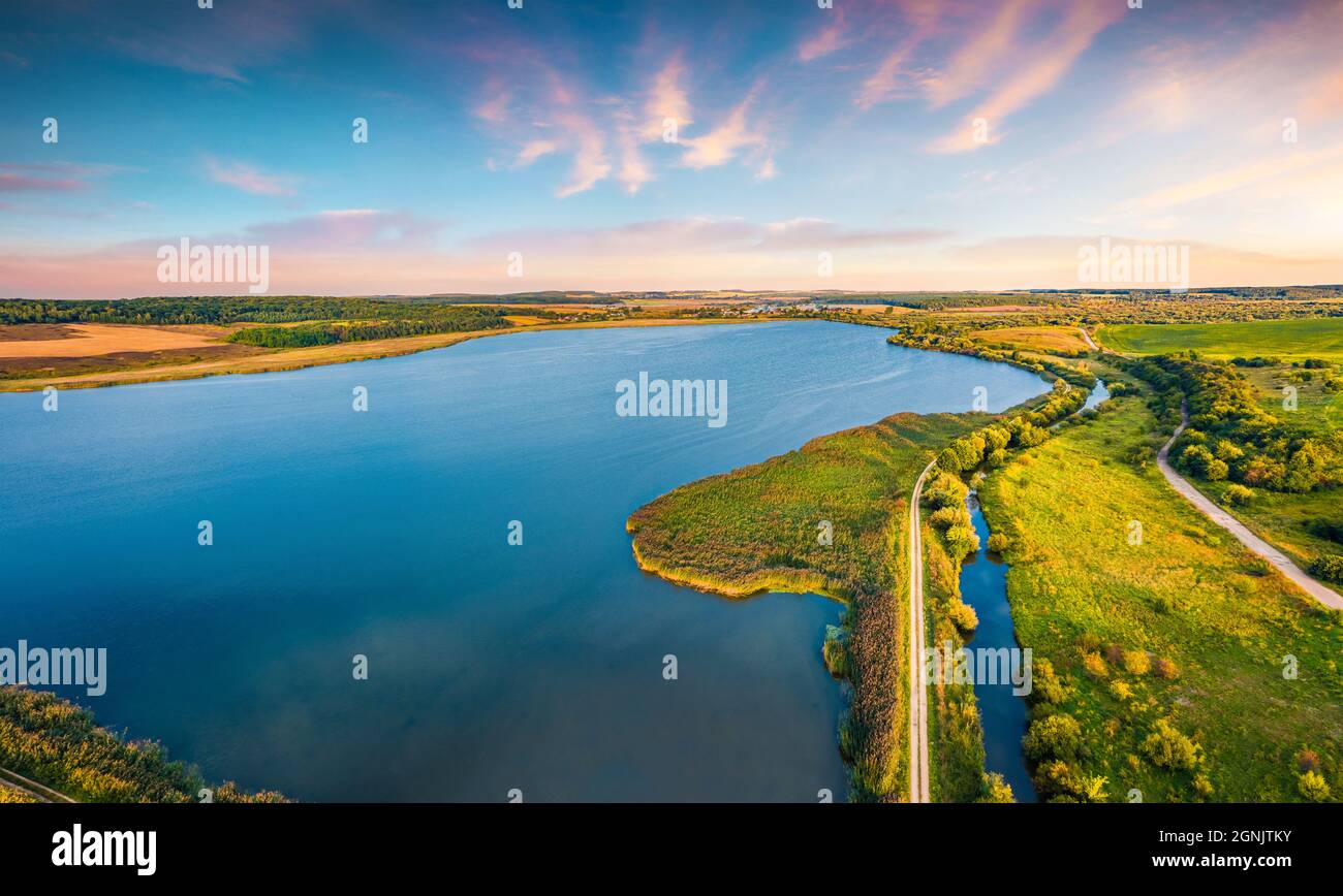 Fantastic summer sunrise on Vertelka lake, Ternopil region. Impressive ...