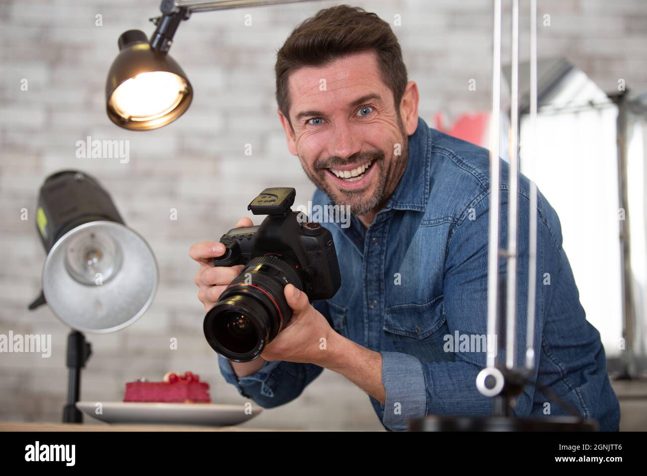 close-up shot of hard-working food photographer Stock Photo - Alamy
