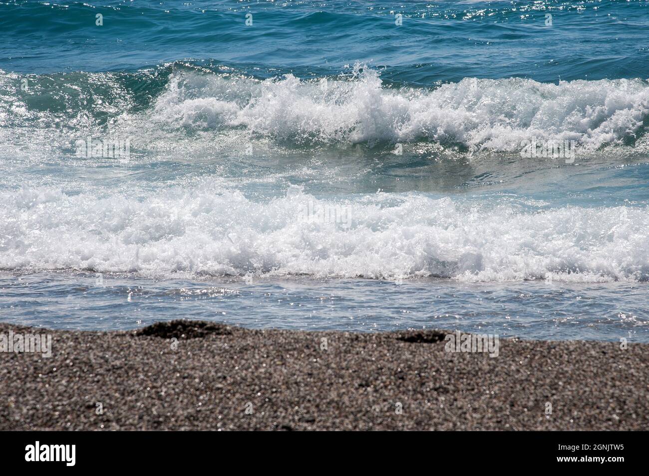 Splashing in the waves hi-res stock photography and images - Alamy