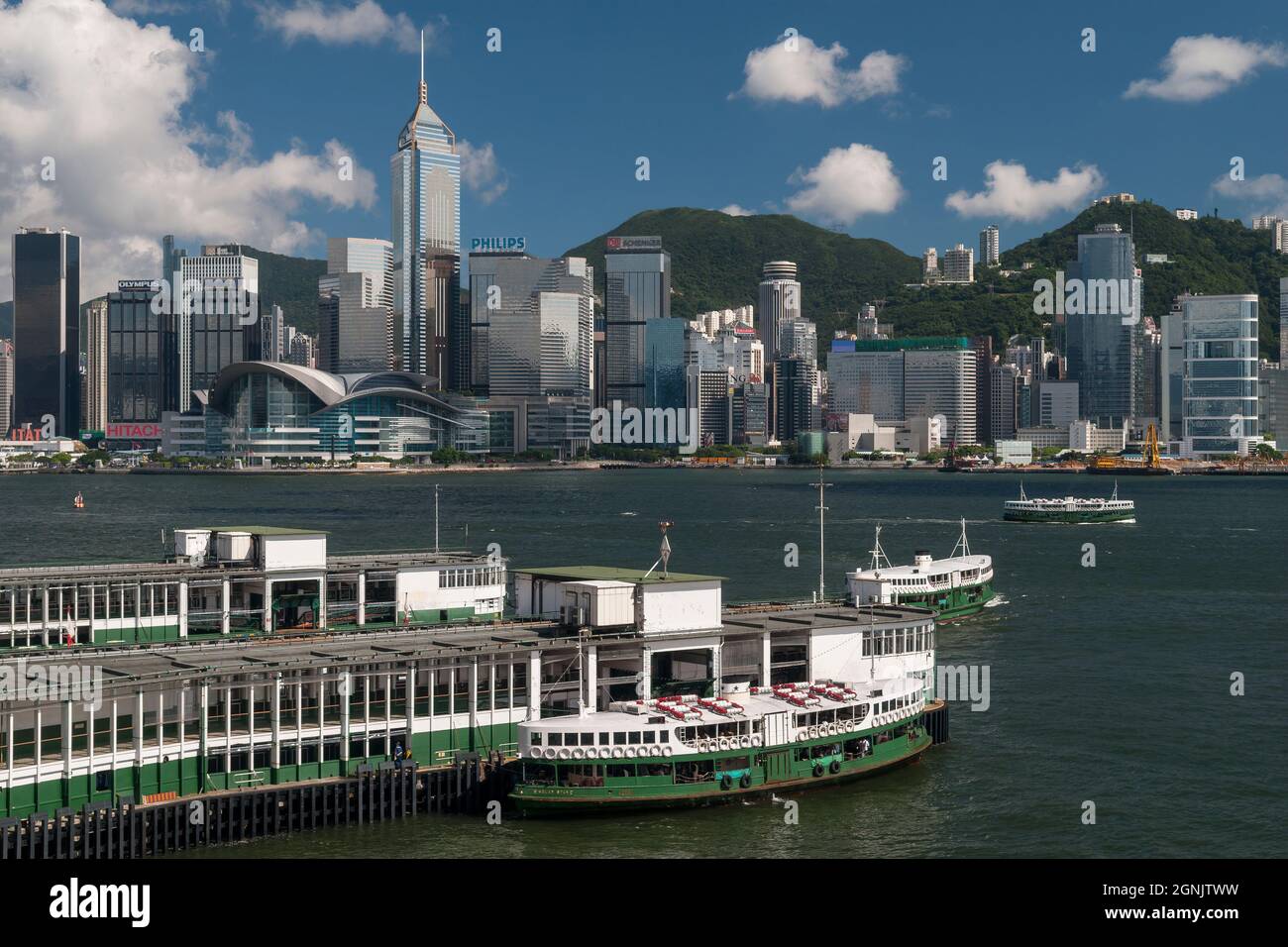 Star Ferries travel across Victoria Harbour between Tsim Sha Tsui pier ...