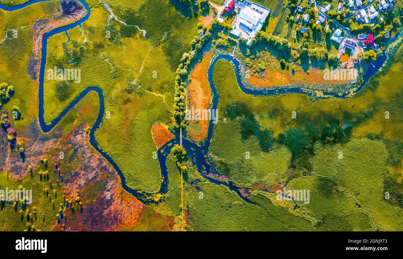 Straight dawn panoramic view from flying drone of bridge over Seret ...