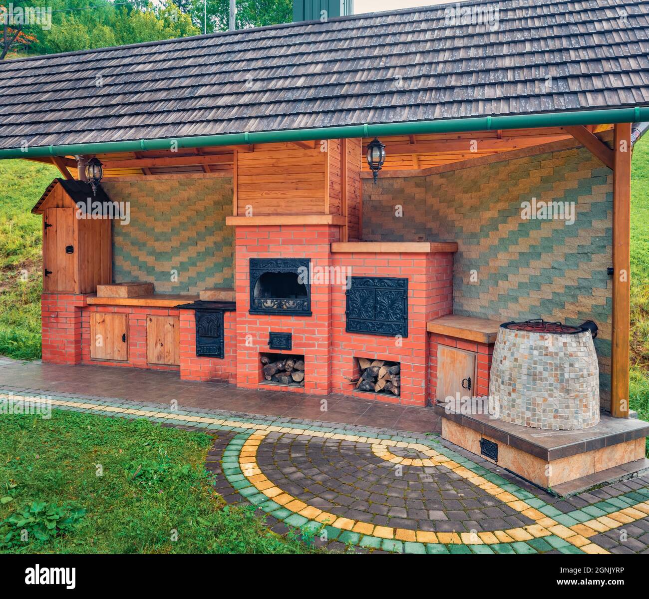 Open air barbecue area in Carpathian style. Summer outdoor scene of ...