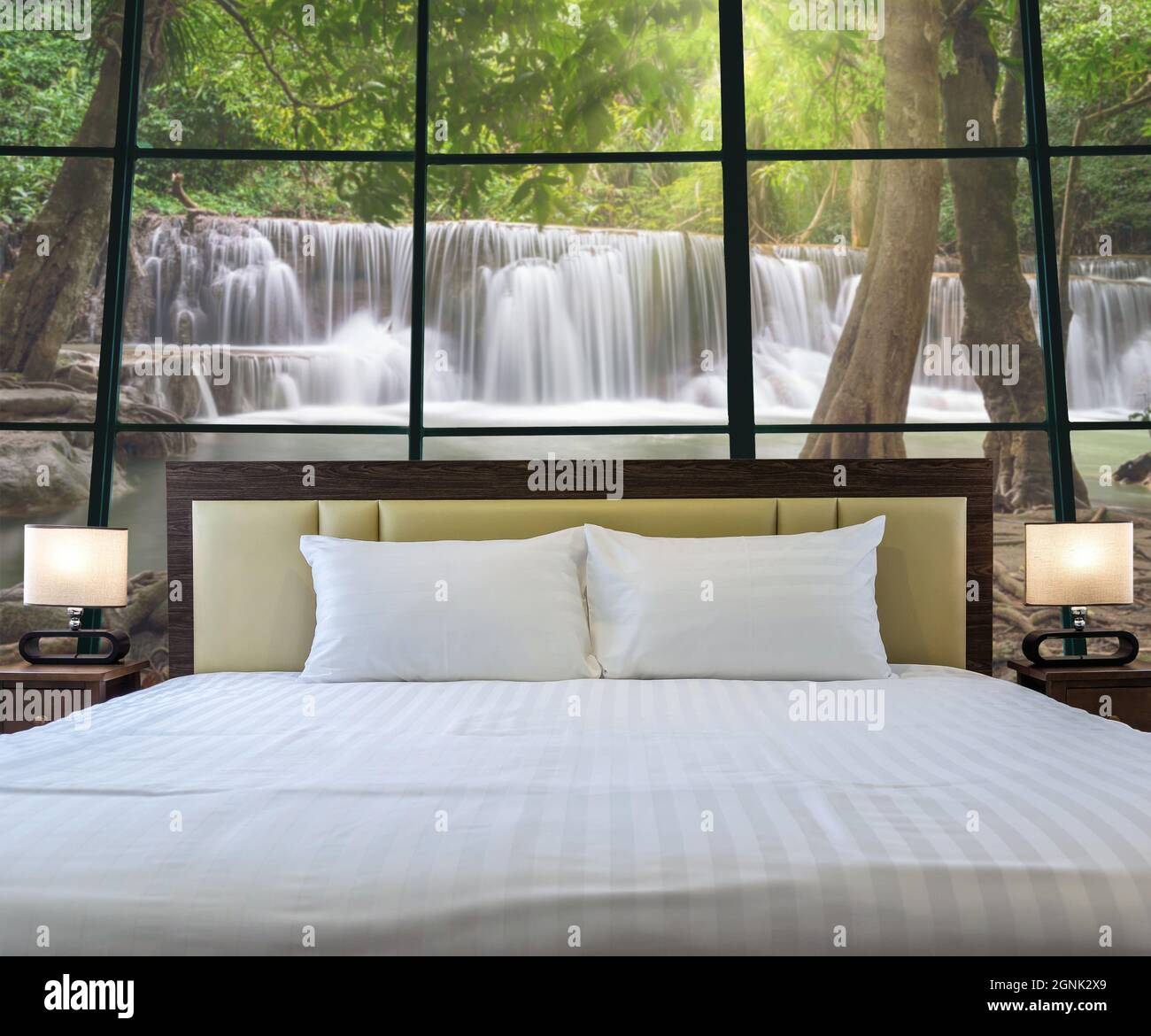 Luxury Interior bedroom with windows glass beside Beautiful waterfall ...