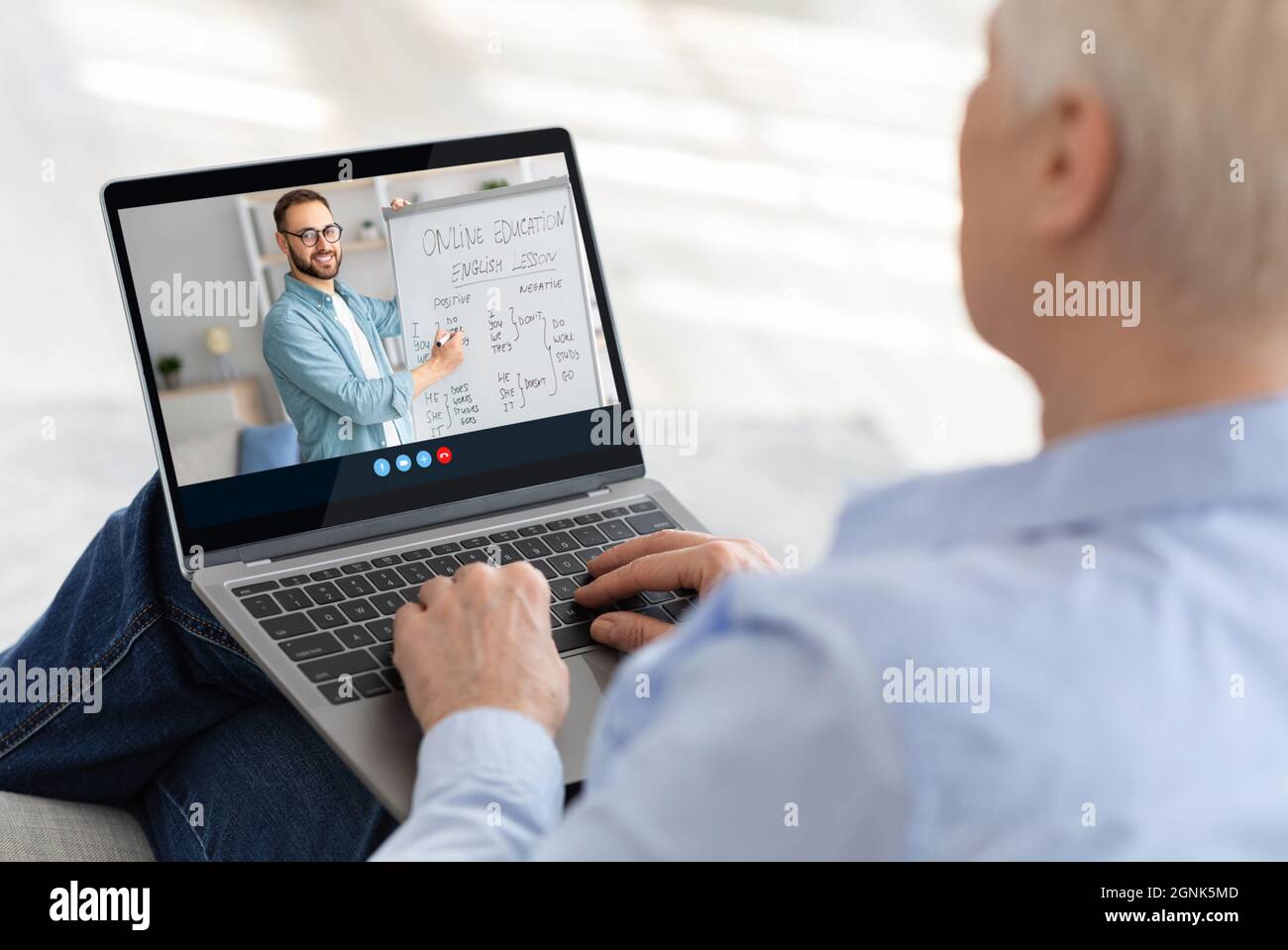 Old european man studies remotely, watches online lesson and learns ...