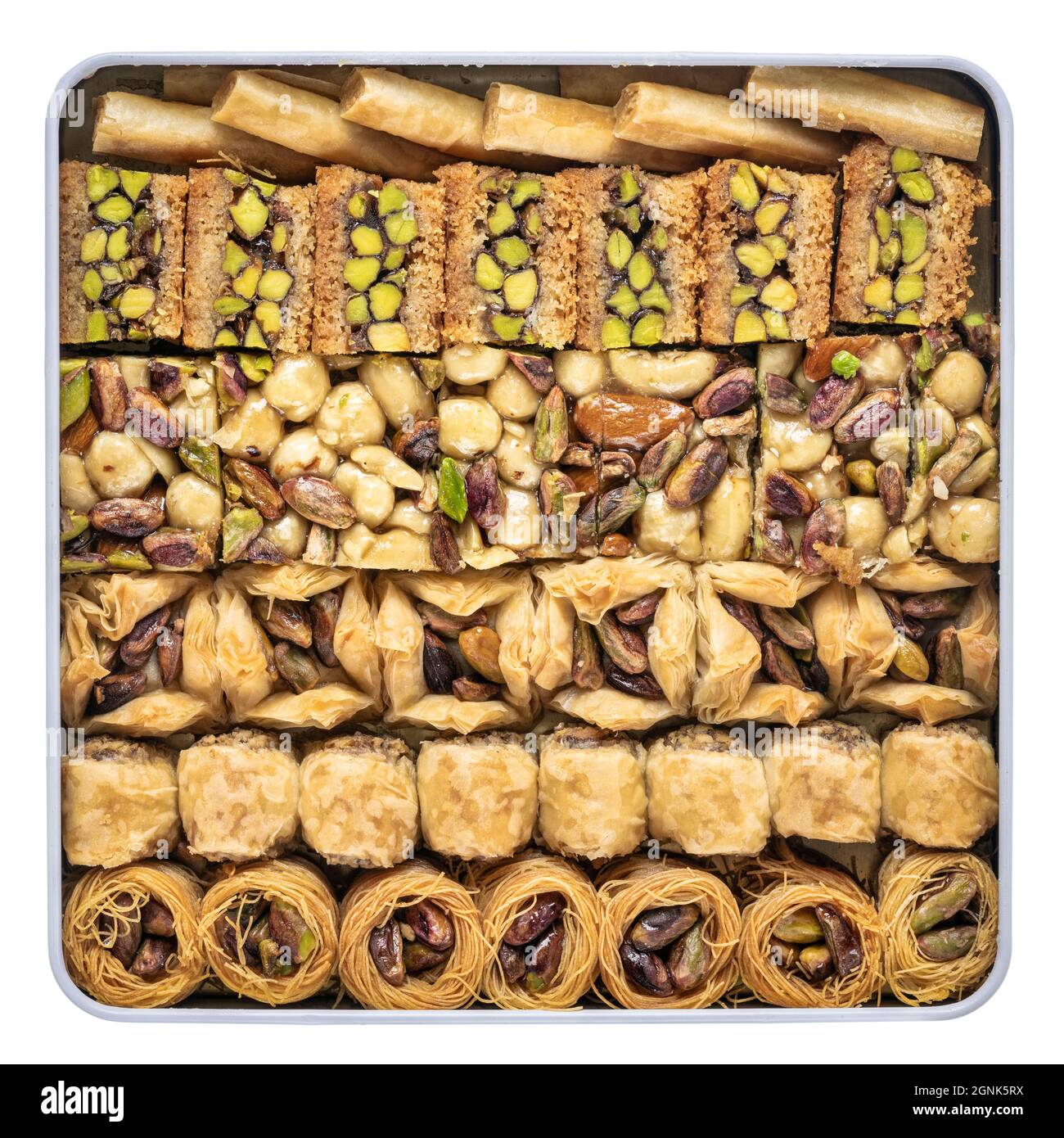 assortment of traditional Turkish baklava pastry in a tin box, a ...