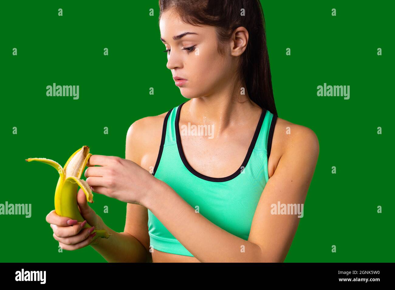 Slim refined muscle girl making fitness and follow a healthy diet for ...