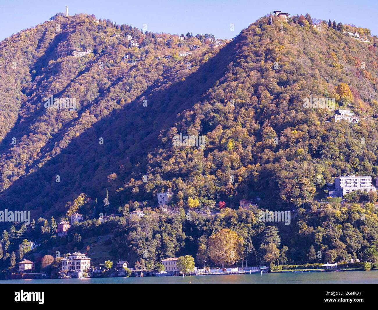 mountains covered with woods in bright autumn colors.Como, italian ...