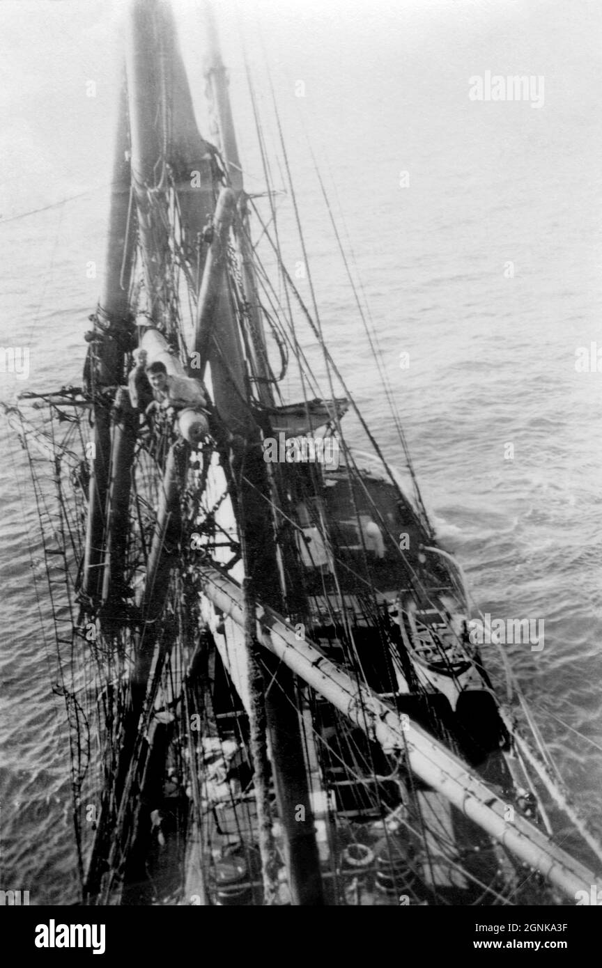 Two sailors up in a mast of the four-masted steel barque Hougomont ...