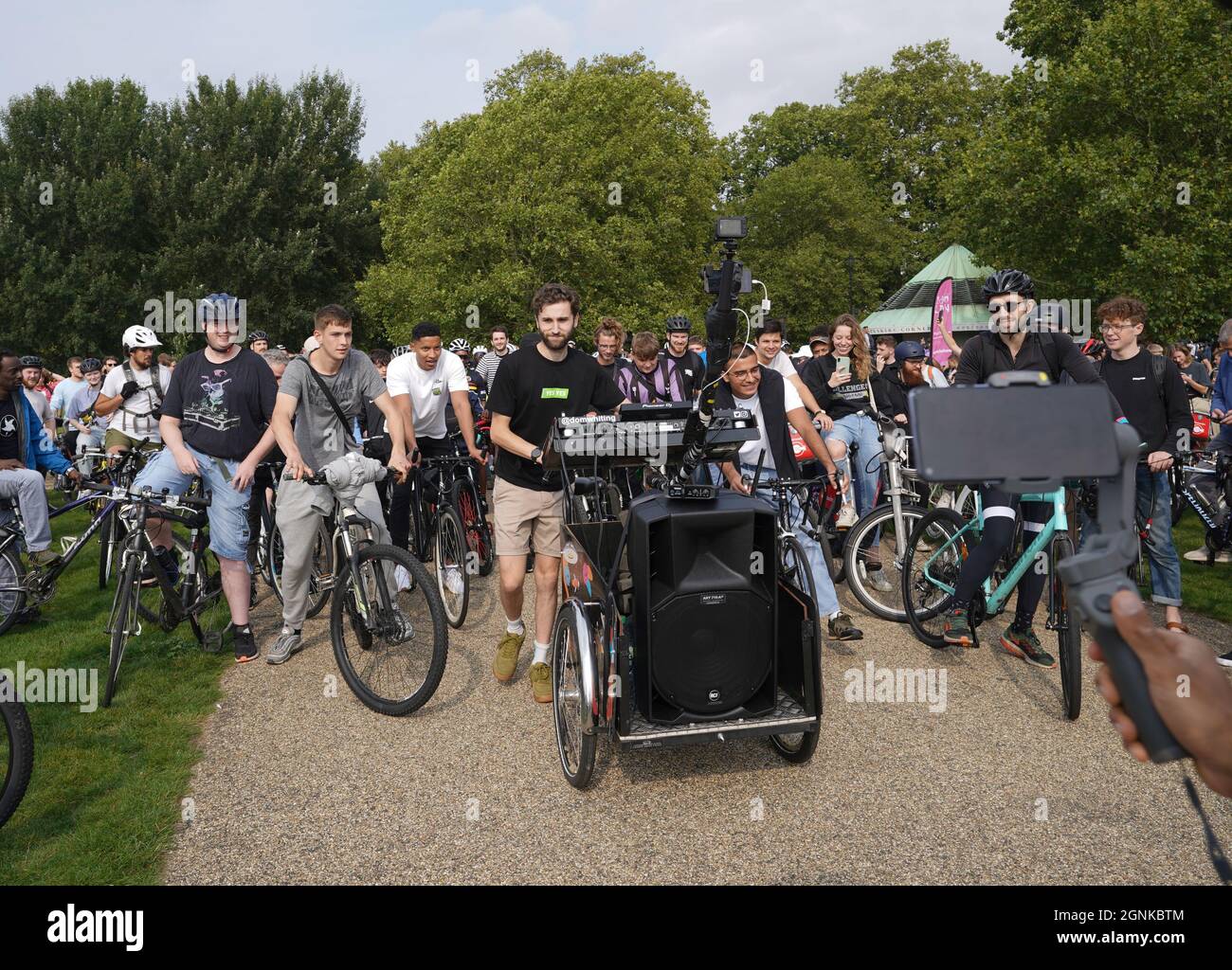 DJ Dom Whiting is followed by hundreds of cyclists as plays music from ...