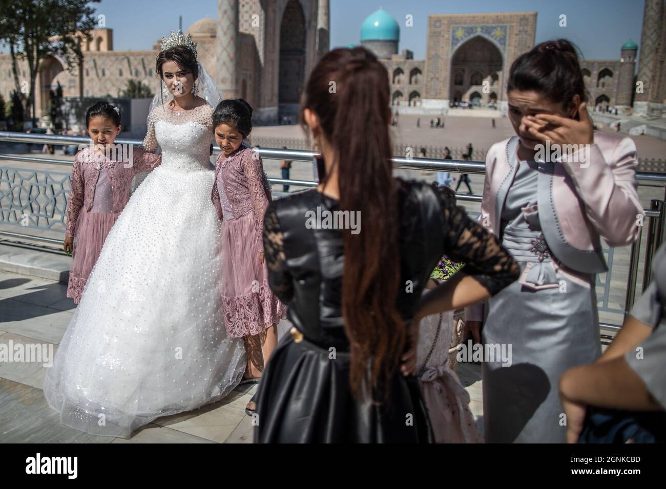 26 September 2021, Uzbekistan, Samarkand: An Uzbek bride has wedding ...