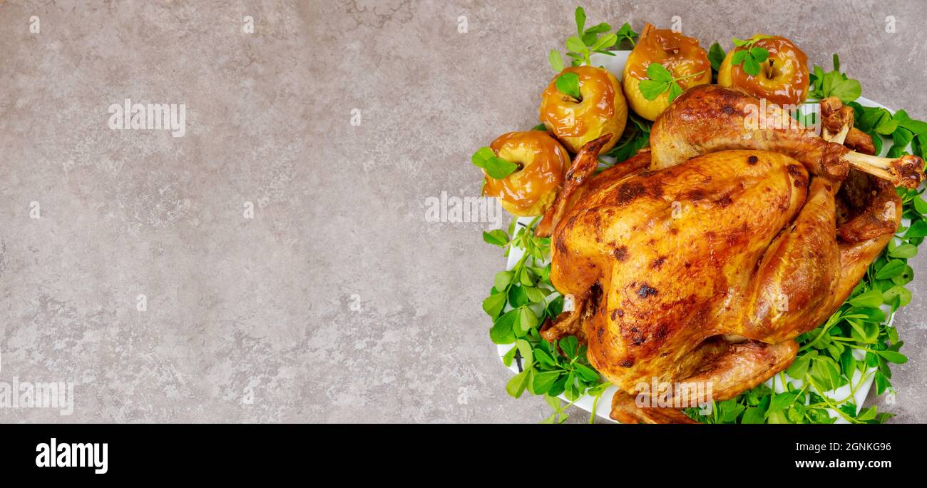 Panoramic photo of roasted turkey garnished with caramel apples ...
