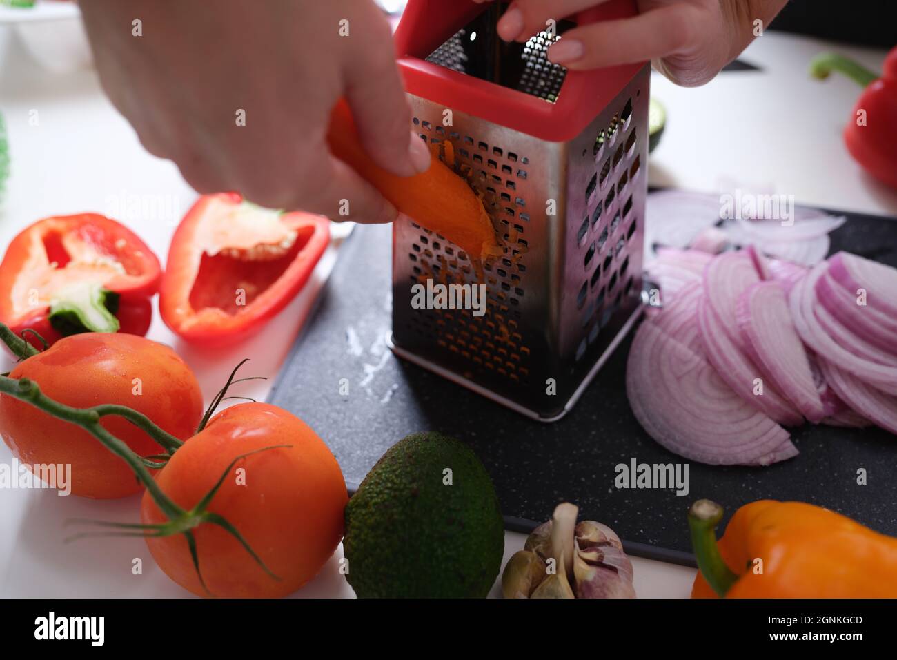 Grating vegetables hi-res stock photography and images - Alamy