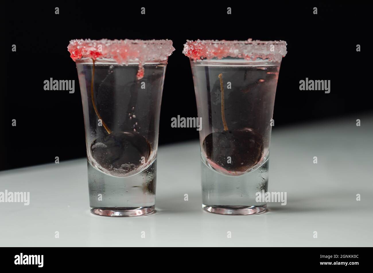 Drink based on vodka, transparent cherry liqueur and syrup in drink ...