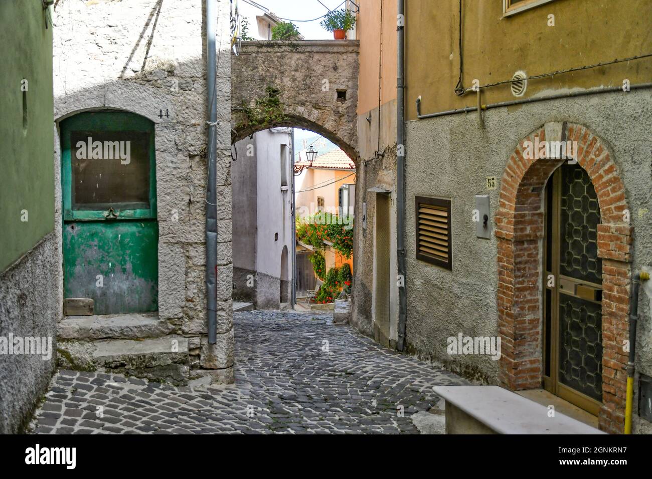 A narrow street in Longano, a medieval town of Molise region, Italy ...