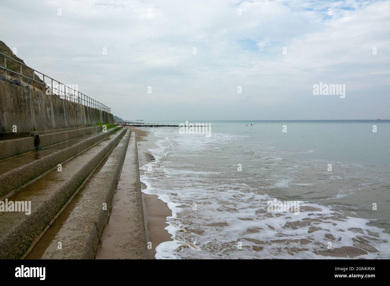 High tide Overstrand beach Stock Photo - Alamy