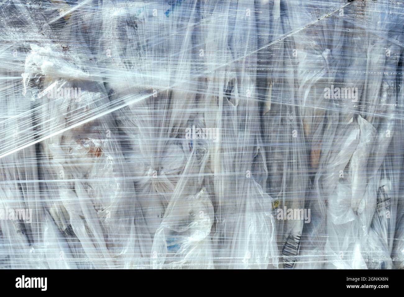 Plastic bags and other trash behind a big box chain store Stock Photo ...
