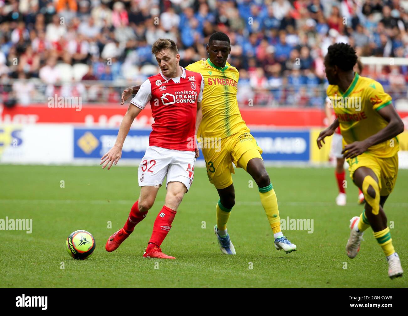 Thomas Foket of Reims, Randal Kolo Muani of Nantes during the French ...