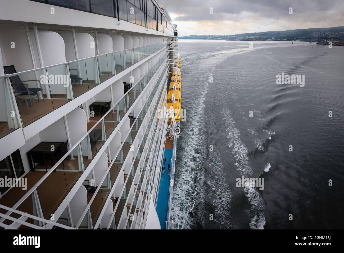 Life boats on the side of a large cruise ship Stock Photo - Alamy