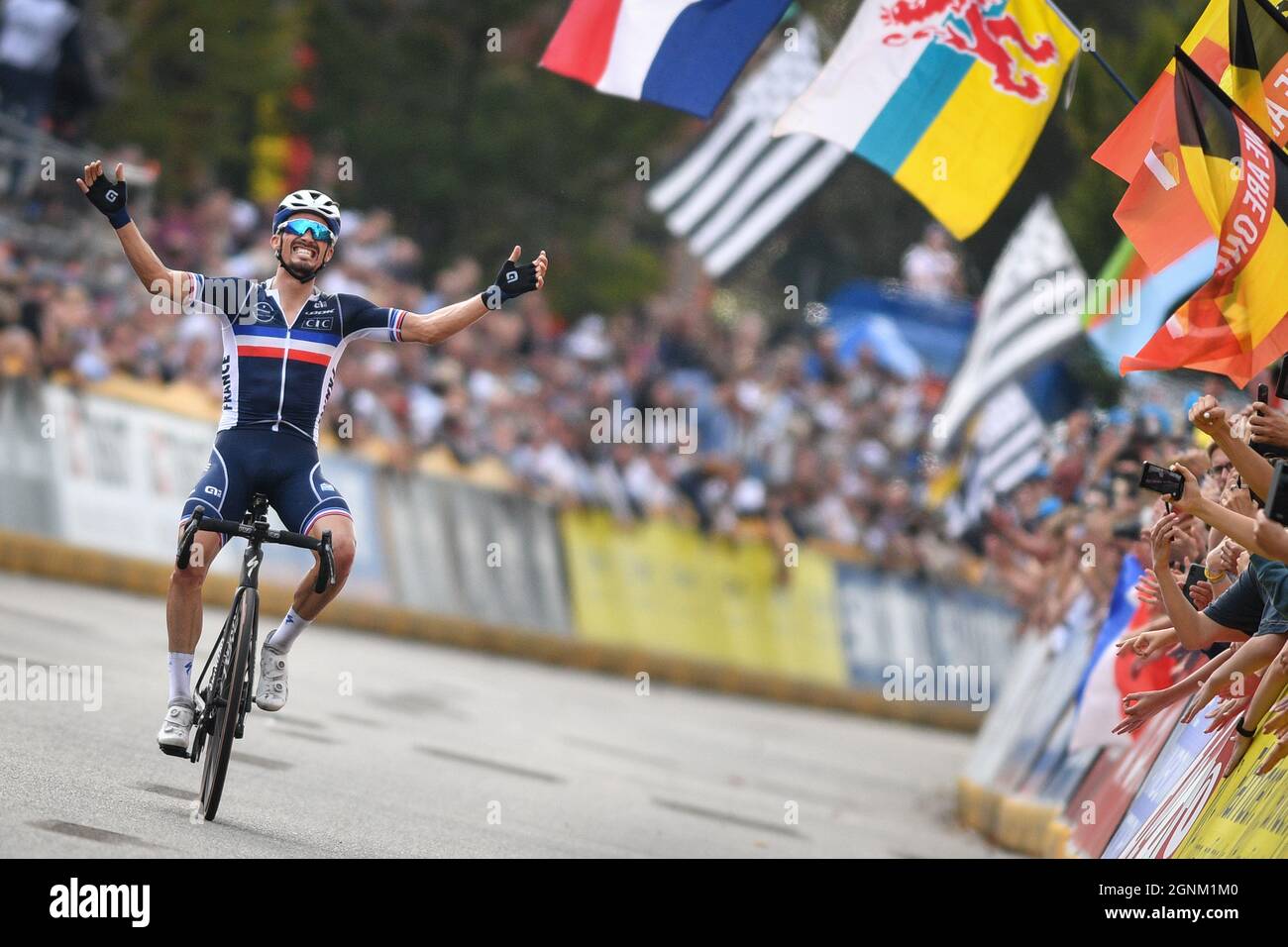 French Julian Alaphilippe celebrates as he crosses the finish line to ...