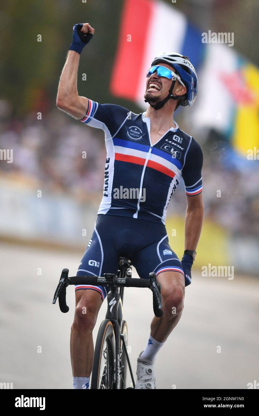 French Julian Alaphilippe celebrates as he crosses the finish line to ...