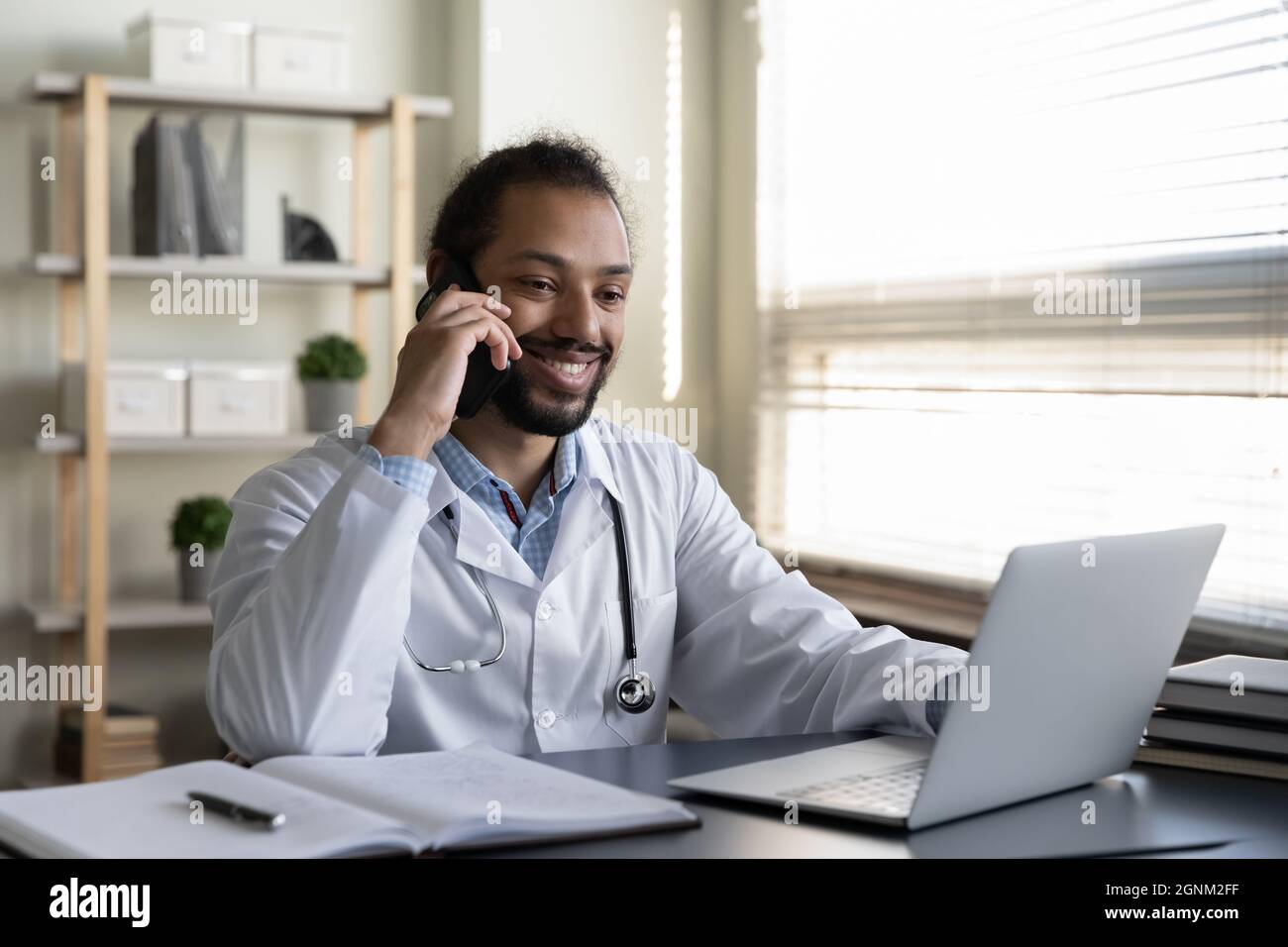 Black man making phone call hi-res stock photography and images - Alamy