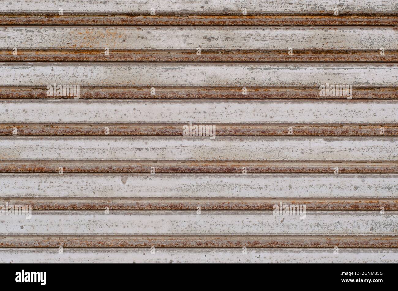 close-up of rusty corrugated iron shutter. concept of time passing ...