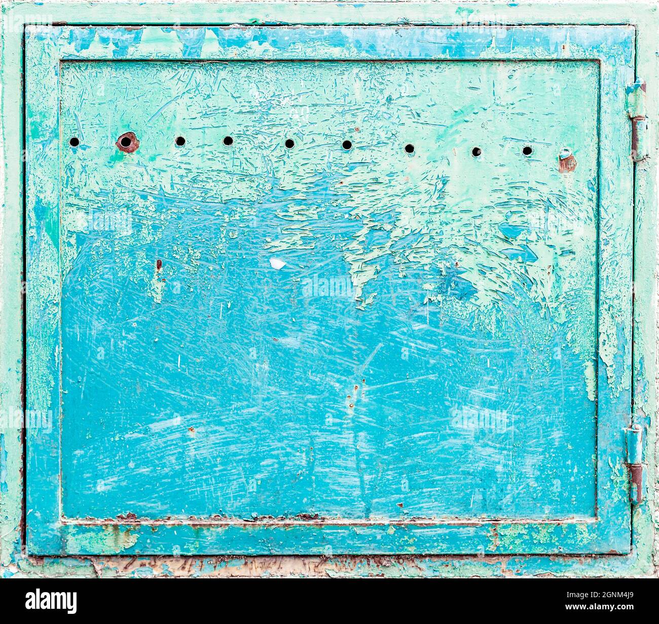 rusty and scratched metal panel background with many holes Stock Photo ...