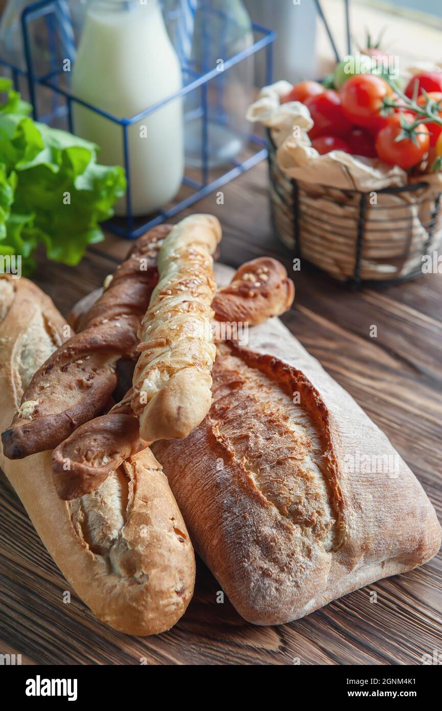 An assortment of different types of bread. Italian ciabatta bread ...