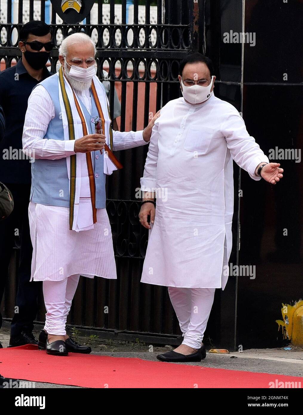 NEW DELHI, INDIA – SEPTEMBER 26: Prime Minister Narendra Modi being received by BJP President JP ...