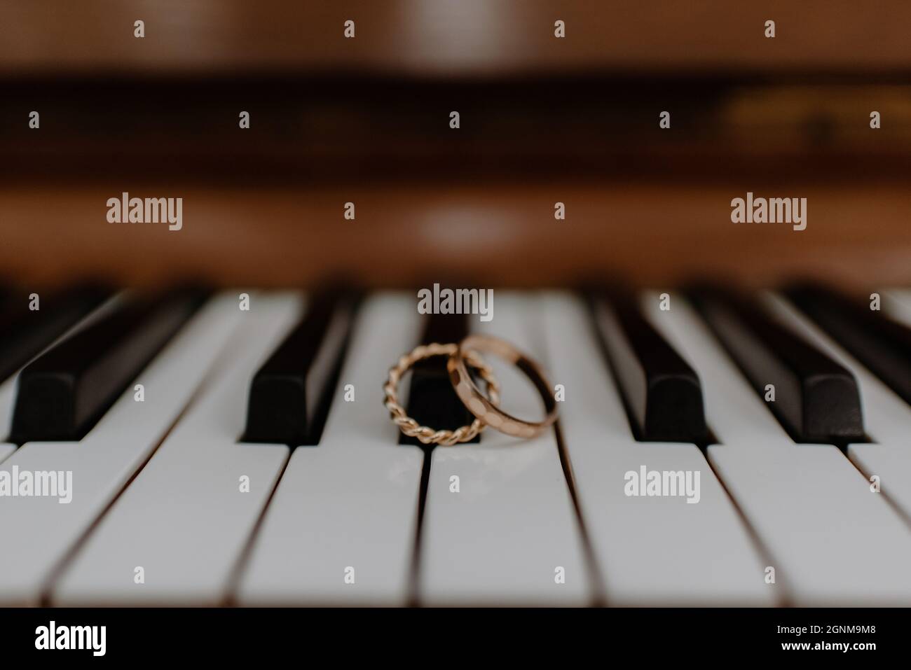 Wedding rings on piano hi-res stock photography and images - Alamy