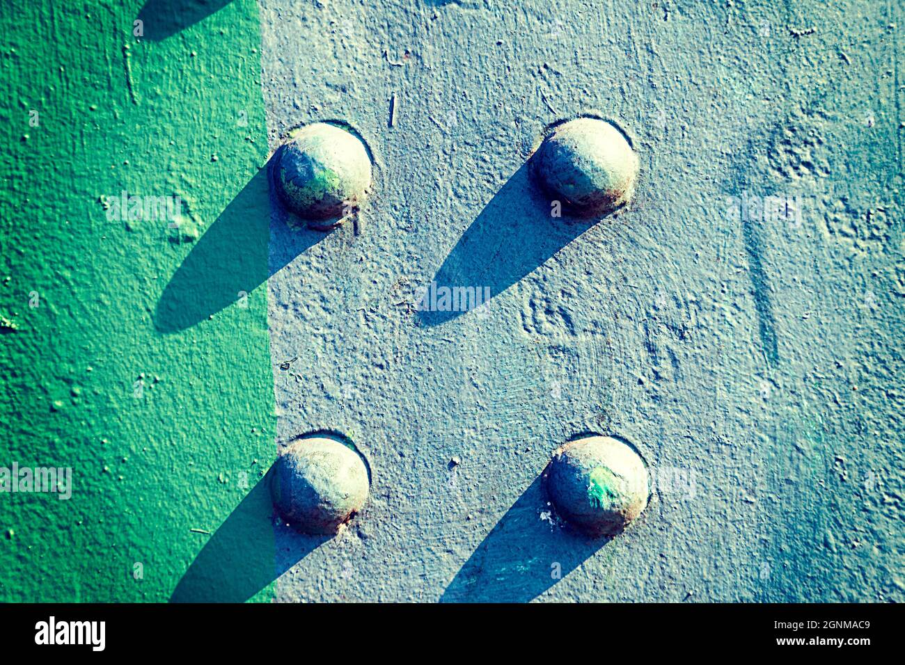 rusty and scratched metal panel background with four bolt Stock Photo ...