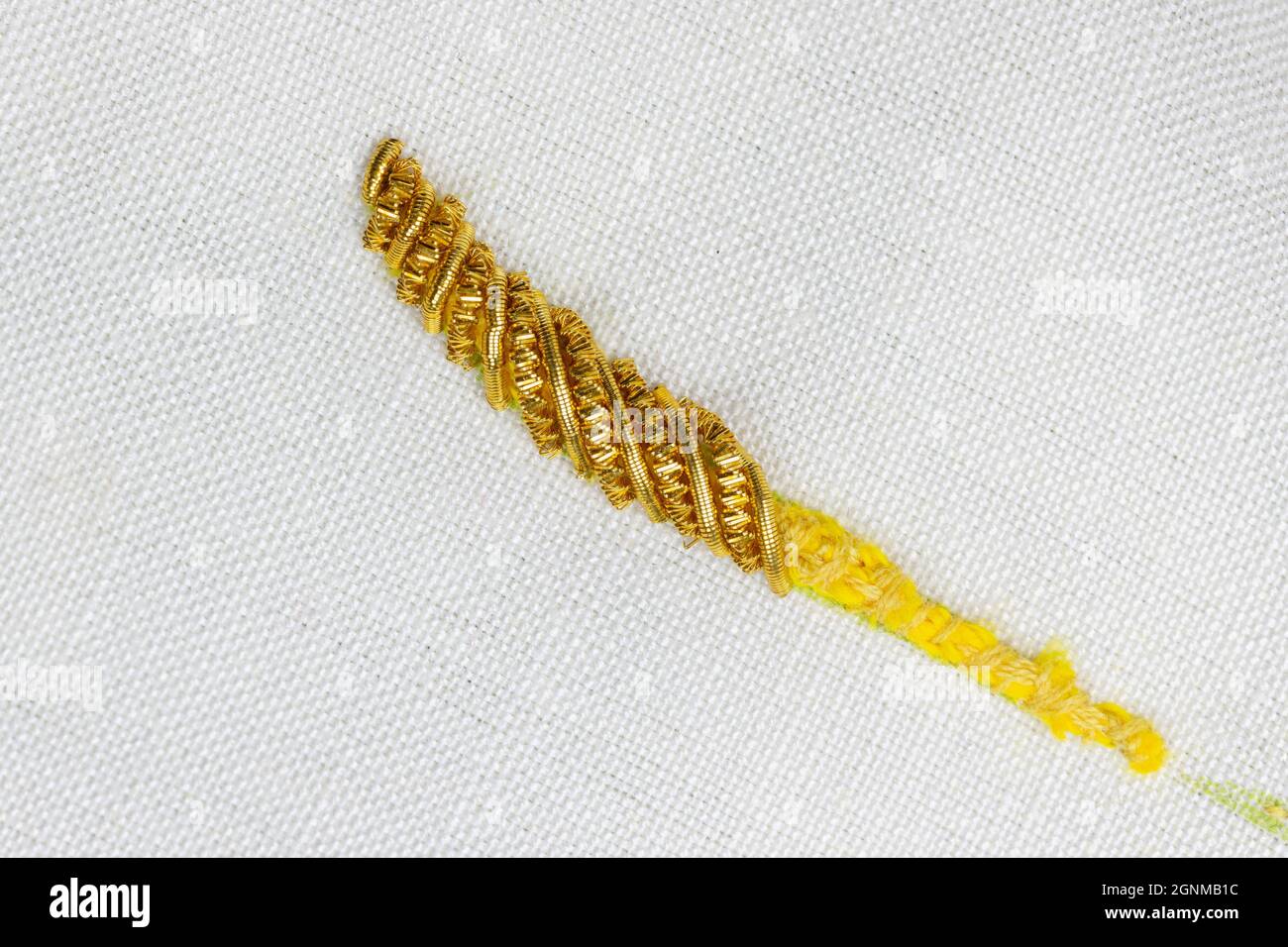 sample of raised goldwork embroidery in progress, smooth purl and ...